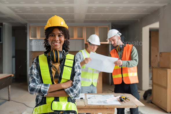 portrait female engineer project manager with construction gear and ...