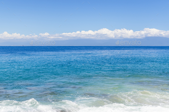 Blue sky with white cloud and sea at summer time Stock Photo by leungchopan