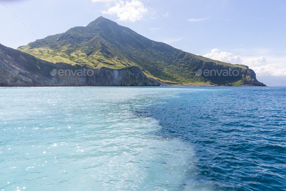 Guishan Island and milk sea in Yilan of Taiwan Stock Photo by leungchopan