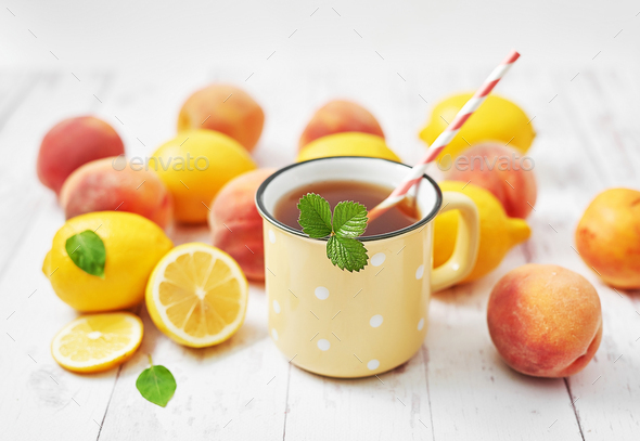 Cup tea with lemon and peaches. Cozy morning. Healthy breakfast. Good ...