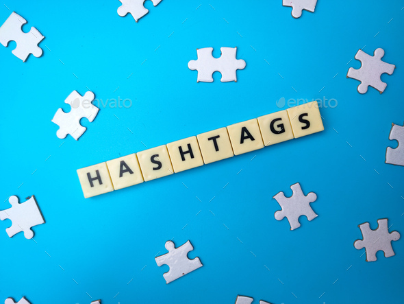 Top view toys word and jig saw puzzle with word HASHTAGS. Stock Photo ...
