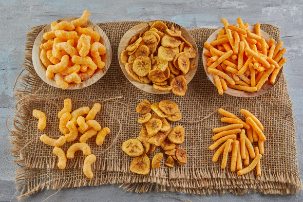 Banana chips are a healthy meal, and spiced corn puff snacks are great ...