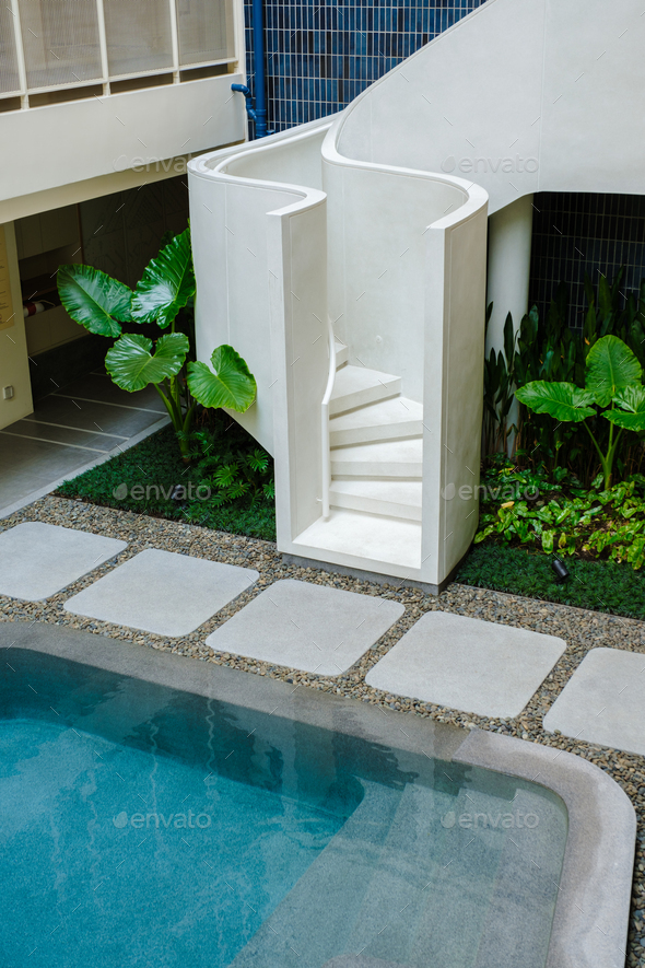 swimming pool at an art deco luxury hotel architecture from the 80s ...