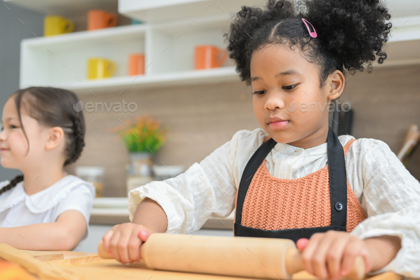 Children making bread in kitchen, Kids learning kitchen skill Stock ...