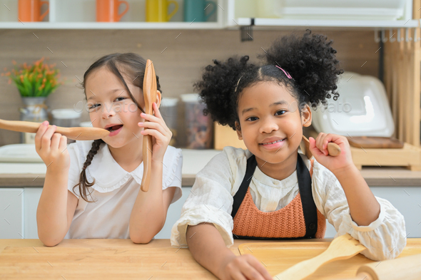 Children making bread in kitchen, Kids learning kitchen skill Stock ...