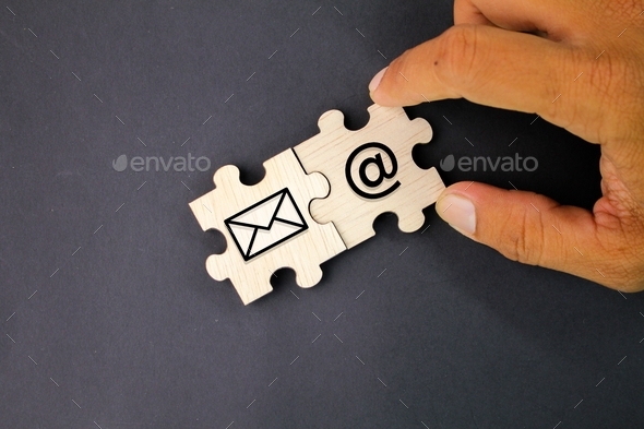 wooden puzzle with email icon and email address. Stock Photo by fauziEv8