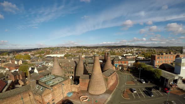 Aerial footage, view of the famous bottle kilns at Gladstone Pottery ...