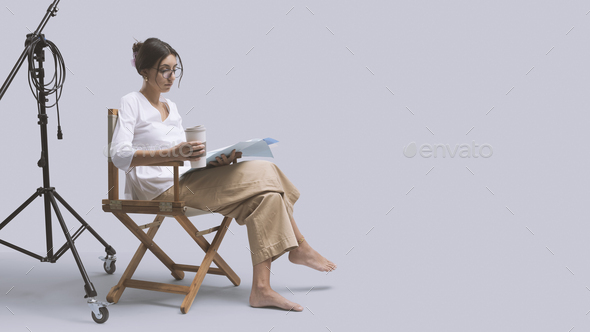 Actress reading a play script Stock Photo by stokkete | PhotoDune