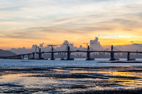 Kinmen Bridge under construction in Taiwan at sunset Stock Photo by ...