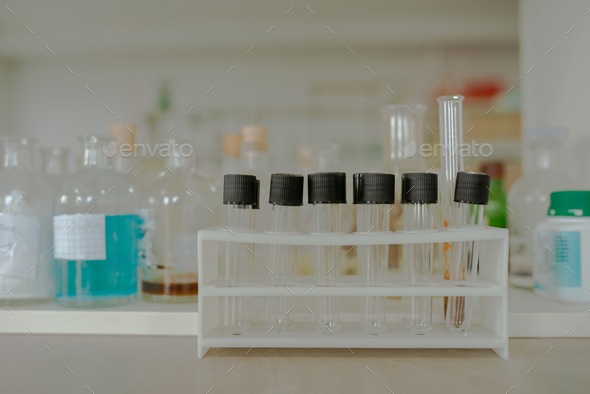 Test tubes in a laboratory on a shelf Stock Photo by wirestock | PhotoDune