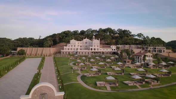 Ascending aerial view of Italian style resort property, Stock Footage