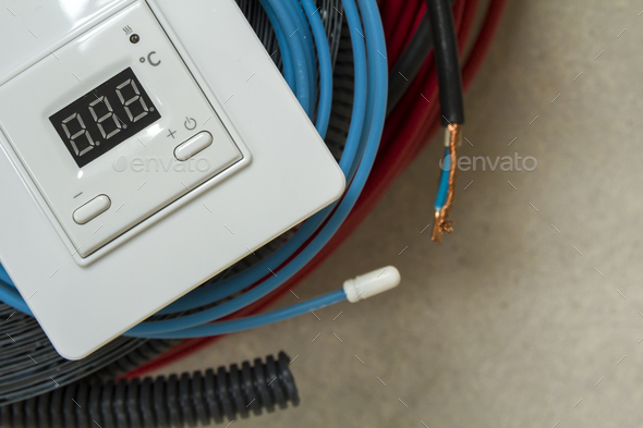 Heating floor system wires, cables and control panel. Stock Photo by ...