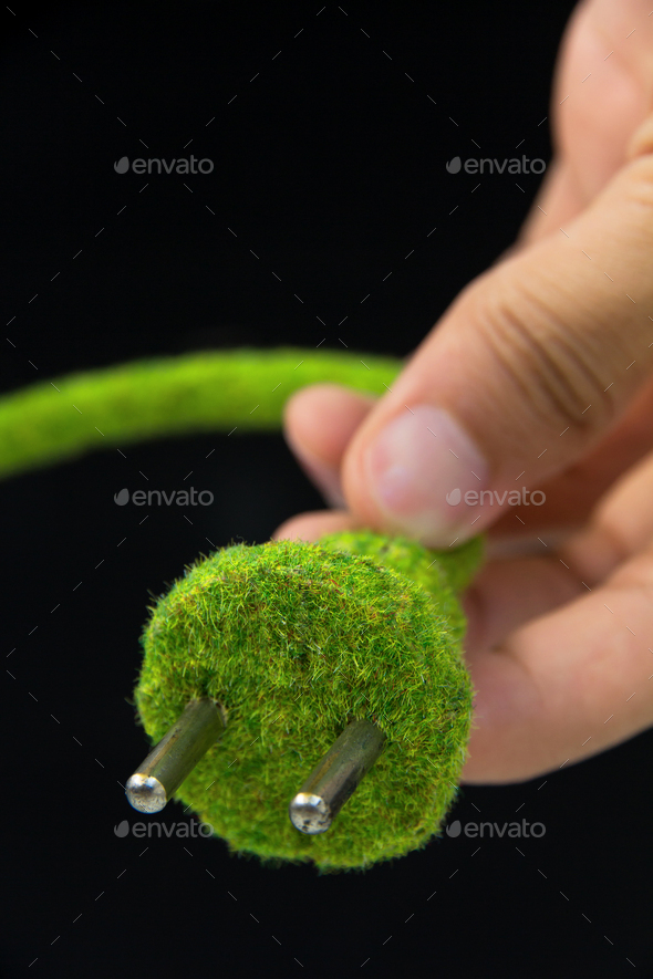 Green electric plug , energy concept Stock Photo by osbmxhouse | PhotoDune