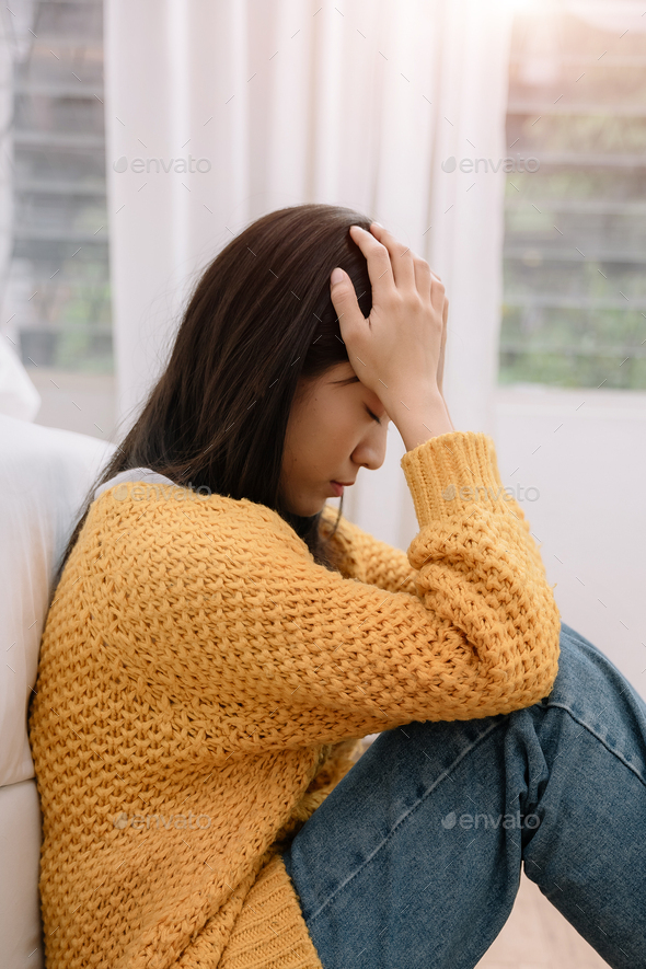 Depressed young woman coping with loss, grief, trauma. Stock Photo by ...