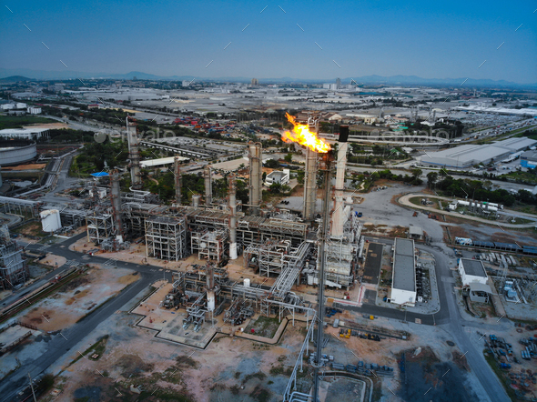 Aerial view of fire explode at the end of chimney for combustion excess ...