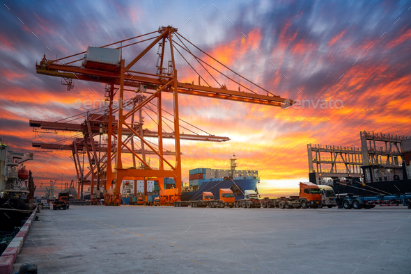 Crane loading cargo container freight container ship in the ...