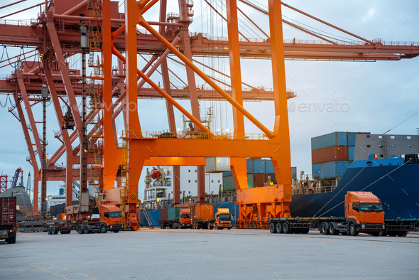 Crane loading cargo container freight container ship in the ...