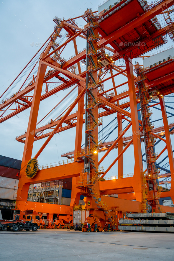 Crane loading cargo container freight container ship in the ...