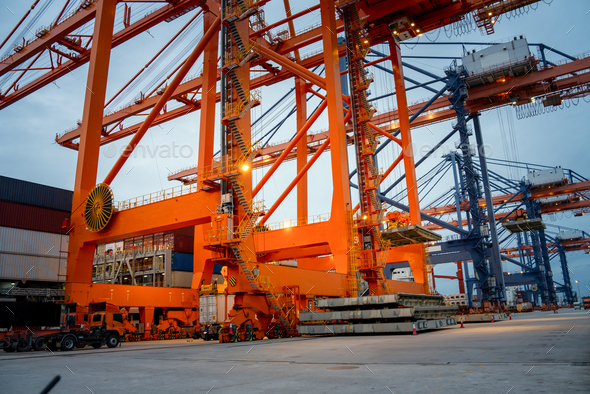 Crane loading cargo container freight container ship in the ...