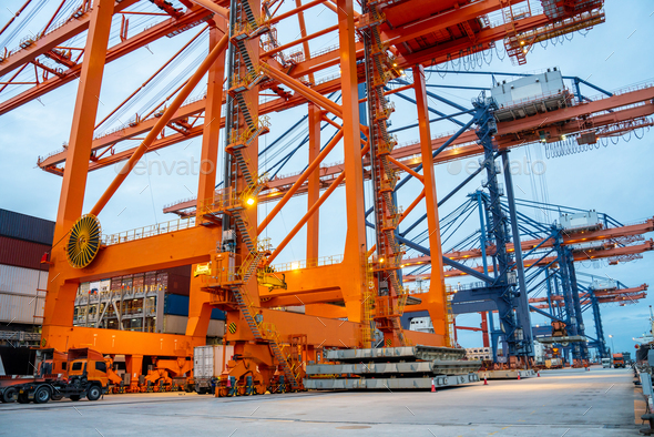 Crane loading cargo container freight container ship in the ...