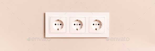 Electrical outlets on beige wall banner Stock Photo by Bykfa | PhotoDune