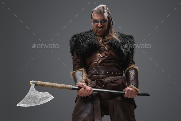 Evil viking from past with huge axe against grey background Stock Photo ...