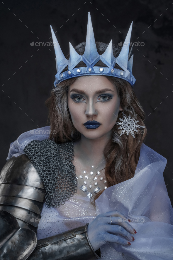 Ice maiden with armor and cloak against dark background Stock Photo by ...