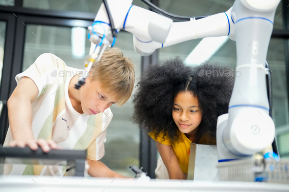 Children using technology, student working with robot for science ...