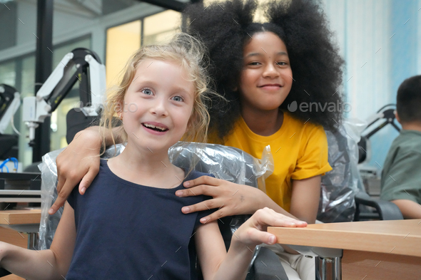 Children using technology, student working with robot for science ...