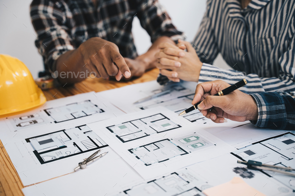 Architecture Engineer Teamwork Meeting, Drawing and working for ...