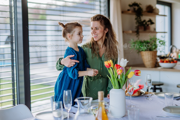 Little girl with her mother celebrating spring. Stock Photo by halfpoint