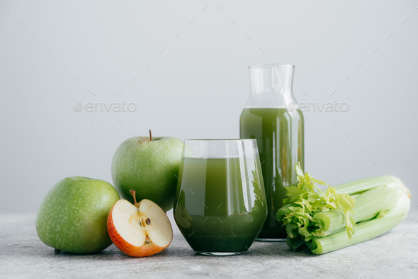 Horizontal shot of freshly blended apples and cerely for your healthy ...