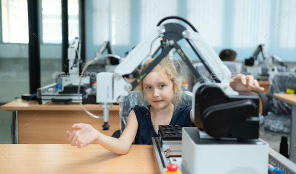 Children using the hand robot technology, Stock Photo by wosunan ...
