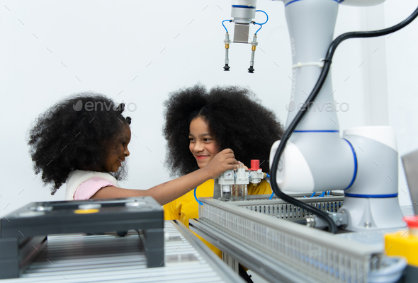 Children using the hand robot technology, Stock Photo by wosunan ...