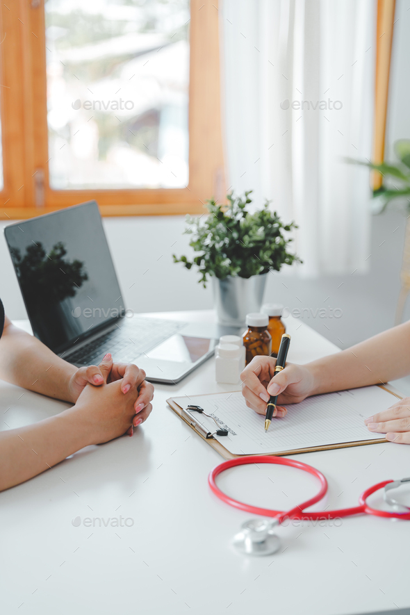 portrait of a female doctor She is recommending medications and ...