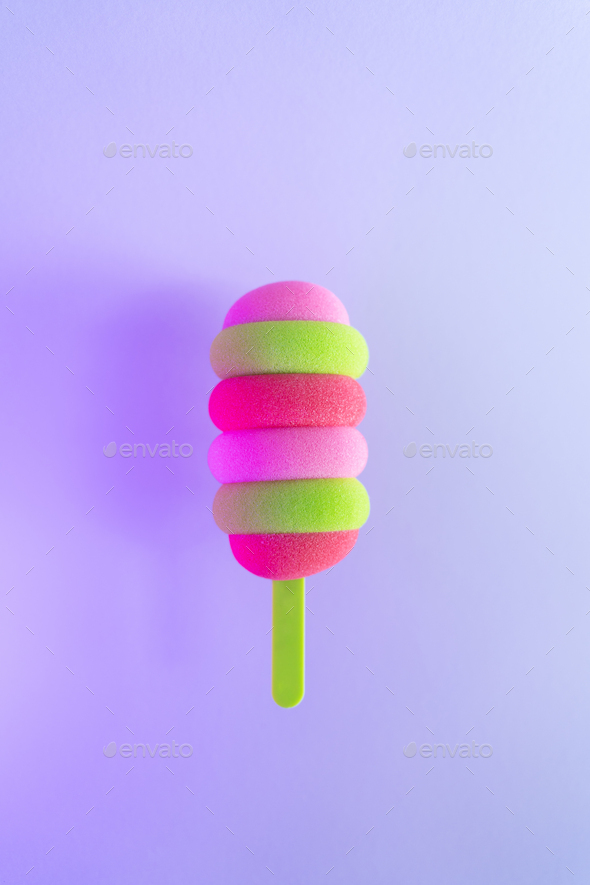Colored ice cream popsicle on a pastel purple background. Minimal ...