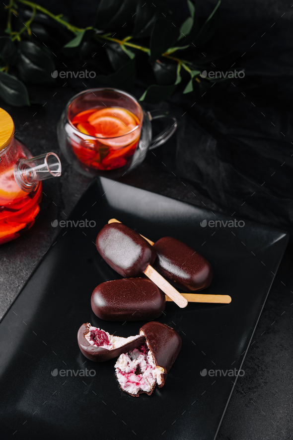 popsicle dessert with cherries and tea Stock Photo by AntAlexStudio