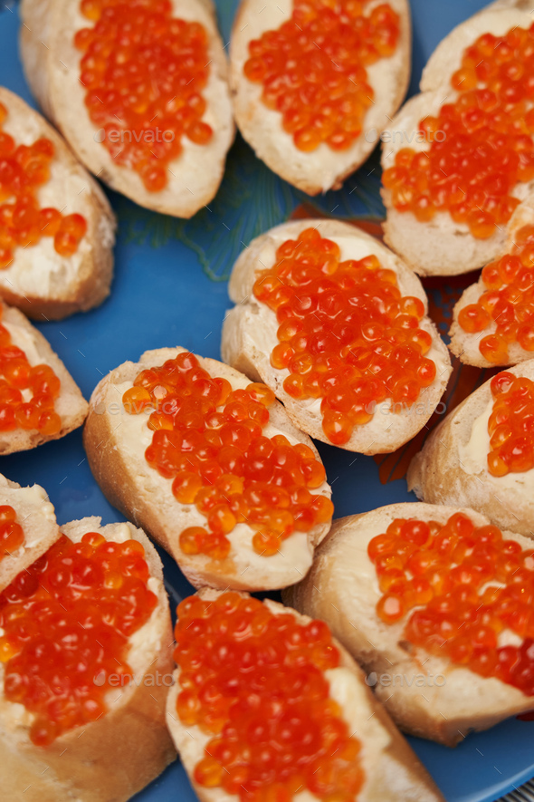 caviar with butter background. red caviar with butter close-up. caviar ...