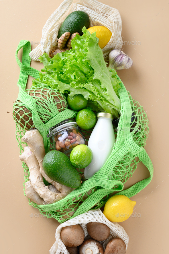 Zero waste. Healthy vegan goods, mesh bag, ginger, salad, vegetables ...