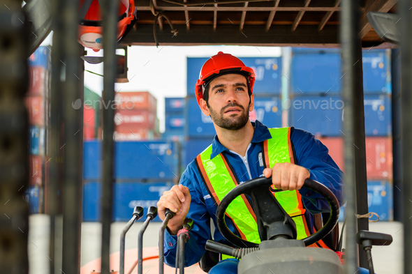 Warehouse engineer worker checking and working at industrial container ...
