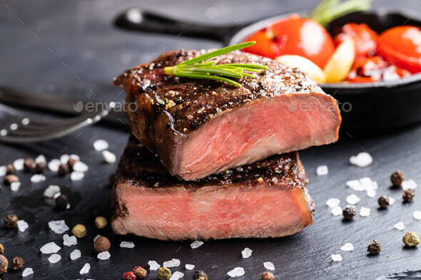 Closeup ready to eat steak Top Blade beef breeds of black Angus with ...