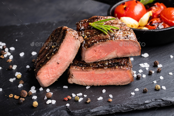 Closeup ready to eat steak Top Blade beef breeds of black Angus with ...