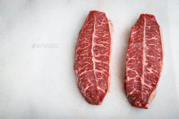 Closeup ready to eat steak Top Blade beef breeds of black Angus with ...