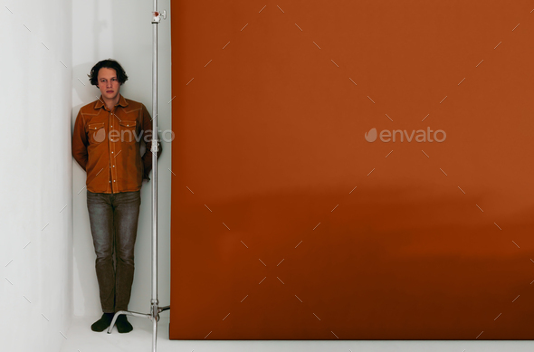 sad man hiding in the corner - showman actor concentrates before the ...