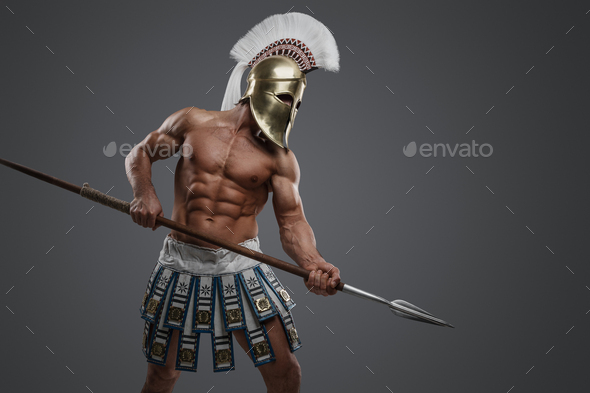 Ancient greek athlete with spear and muscular body Stock Photo by fxquadro