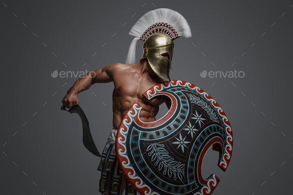Greek swordsman from past with shield and plumed helmet Stock Photo by ...
