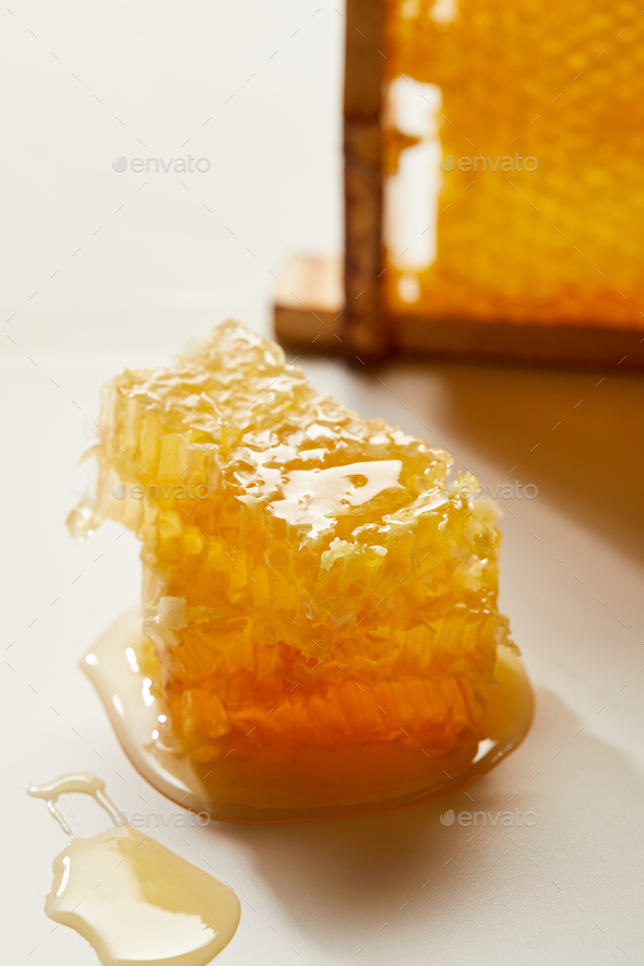 close up view of stack of beeswax on white surface Stock Photo by ...