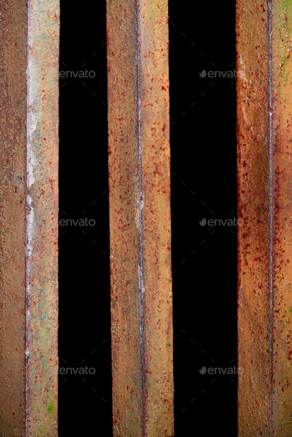 close up view of rust fence with black background behind Stock Photo by ...