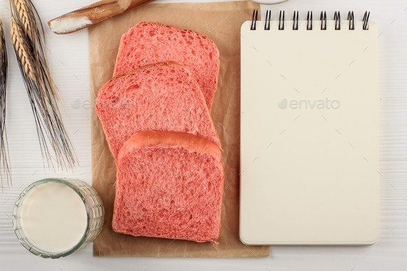 Healthy Sliced Pink Bread Beside Blank Open Book for Cook Book Stock ...