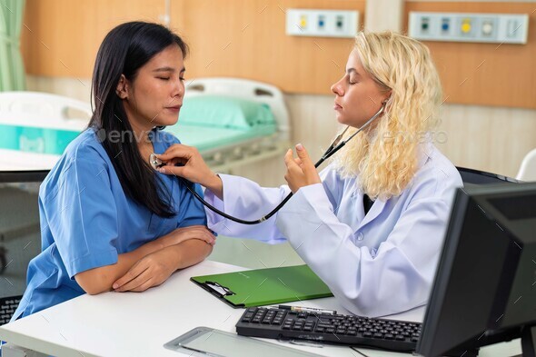 A doctor discus with patient on healthy problem and use stethoscope ...